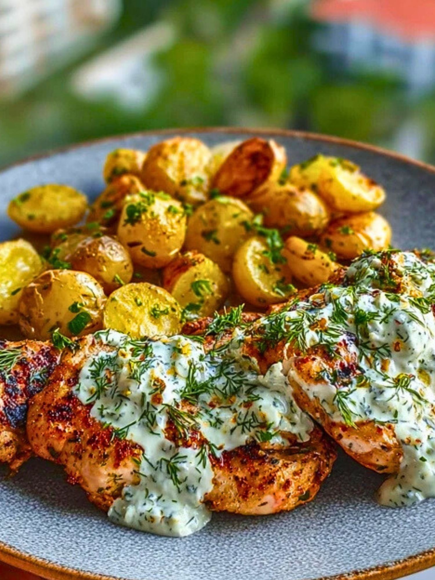 Spicy Yogurt Marinated Chicken with Dill Feta Cream & Crispy Baby Potatoes