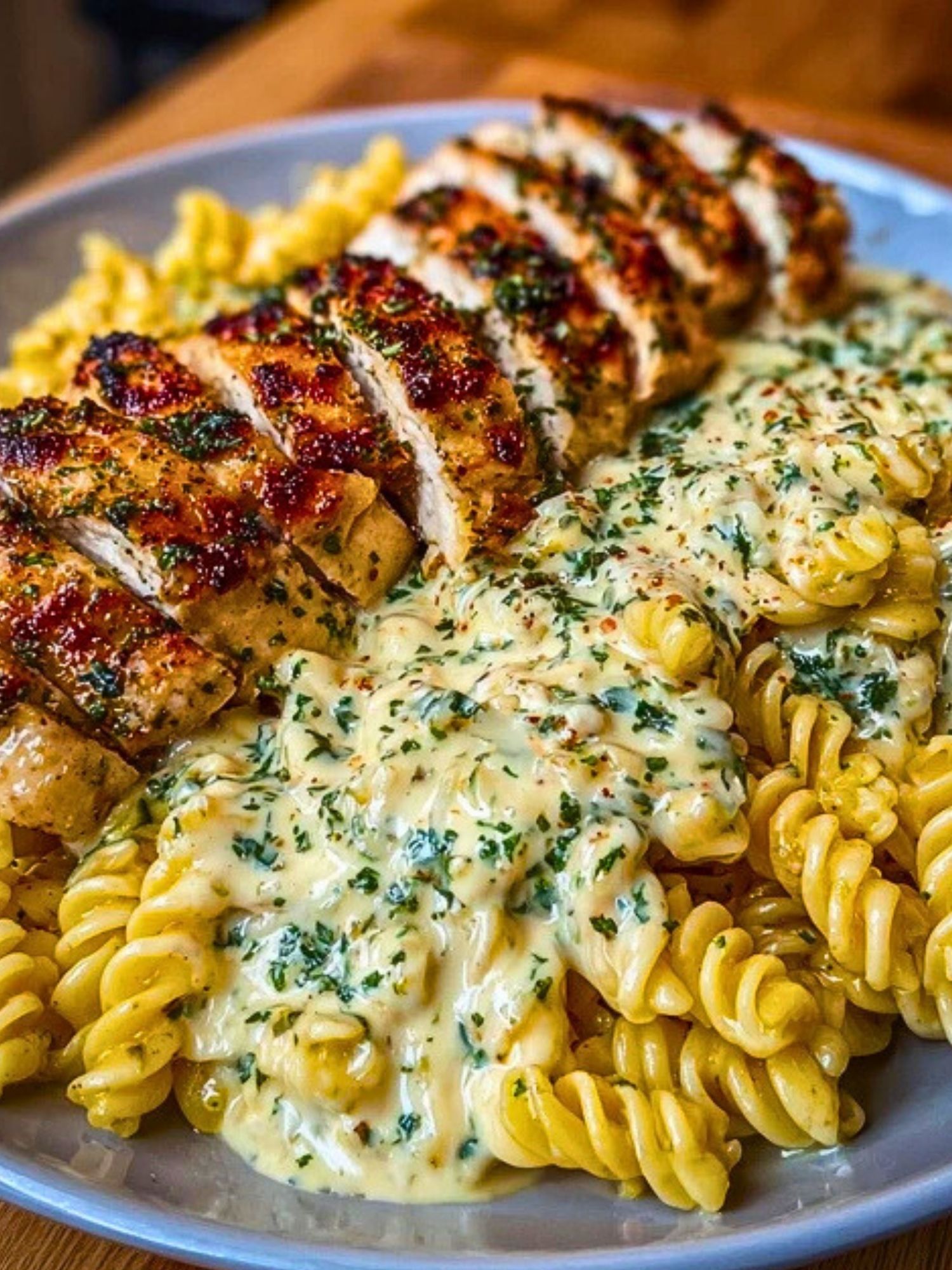 Delicious Creamy Garlic Parmesan Chicken and Cheesy Twisted Pasta
